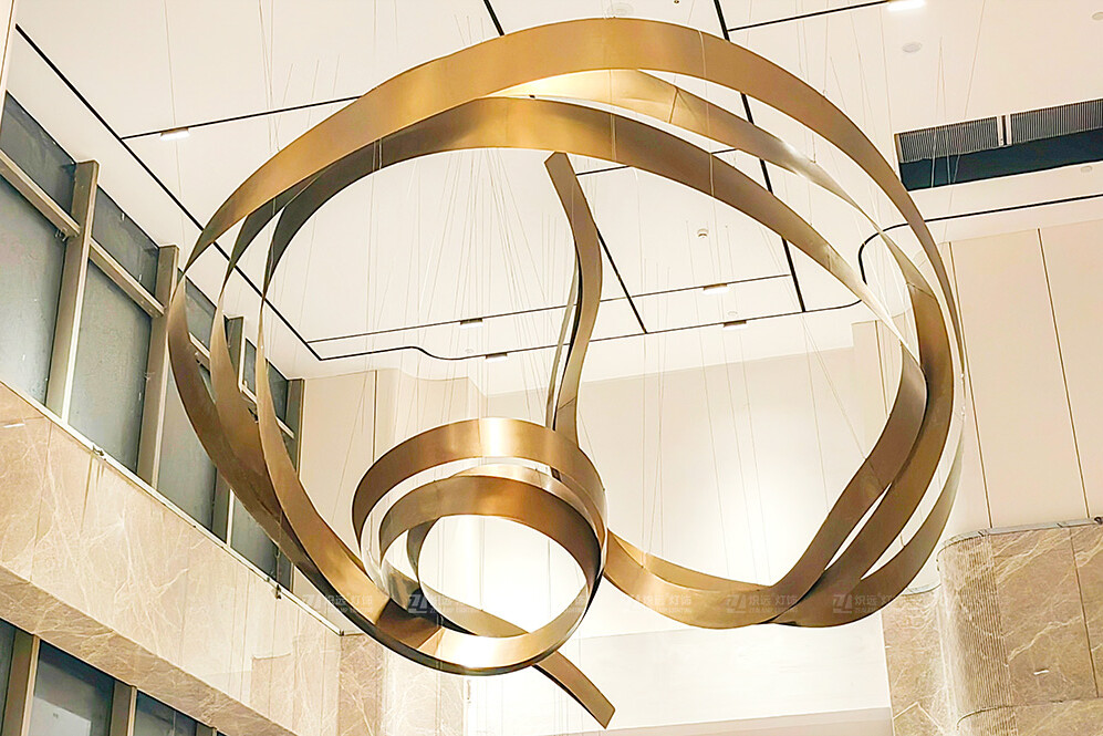 Artistic ribbon chandelier in the lobby of Hongjin Yayuan Sales Center ...